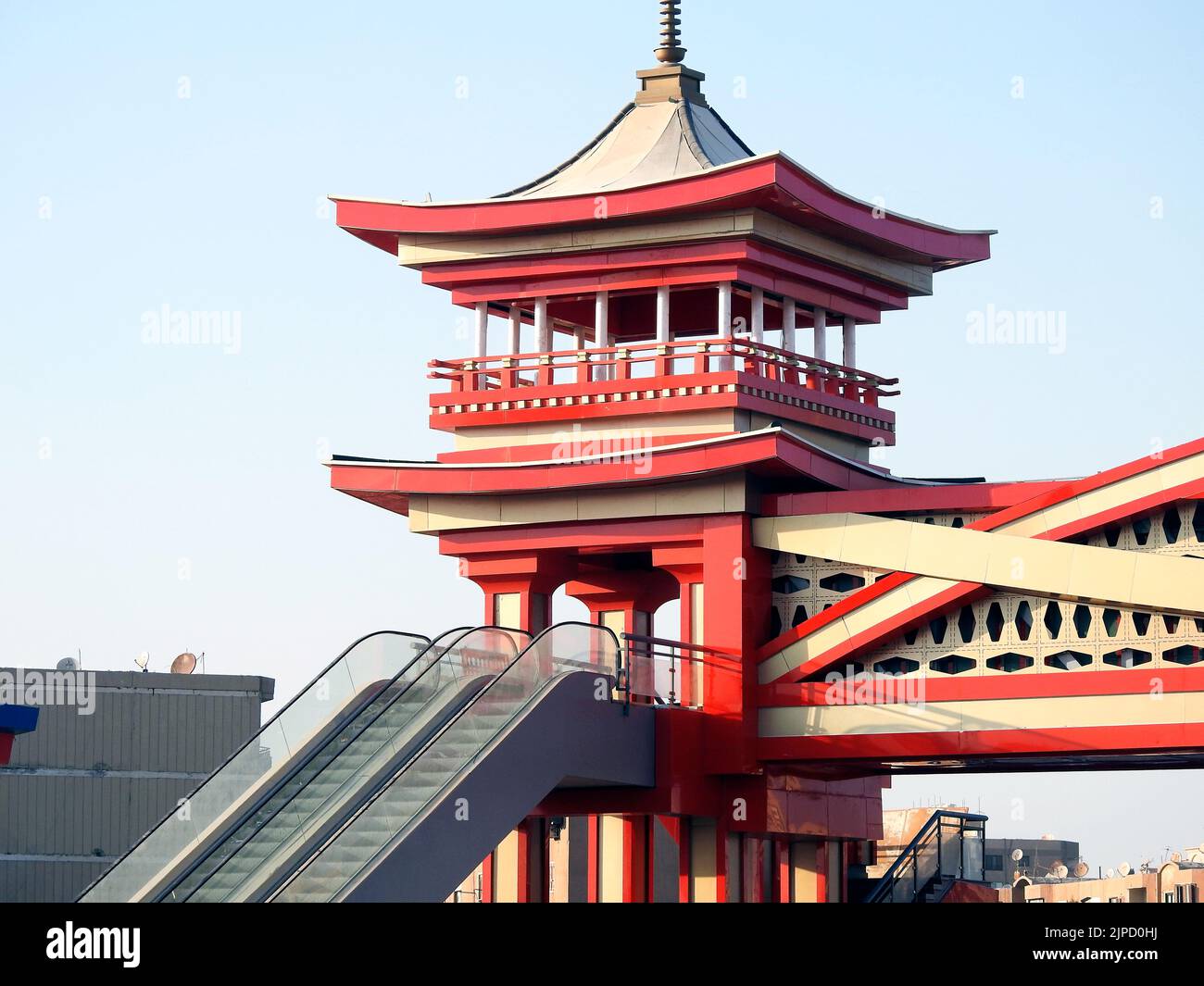 A pedestrian bridge finished in traditional Japanese architectural ...