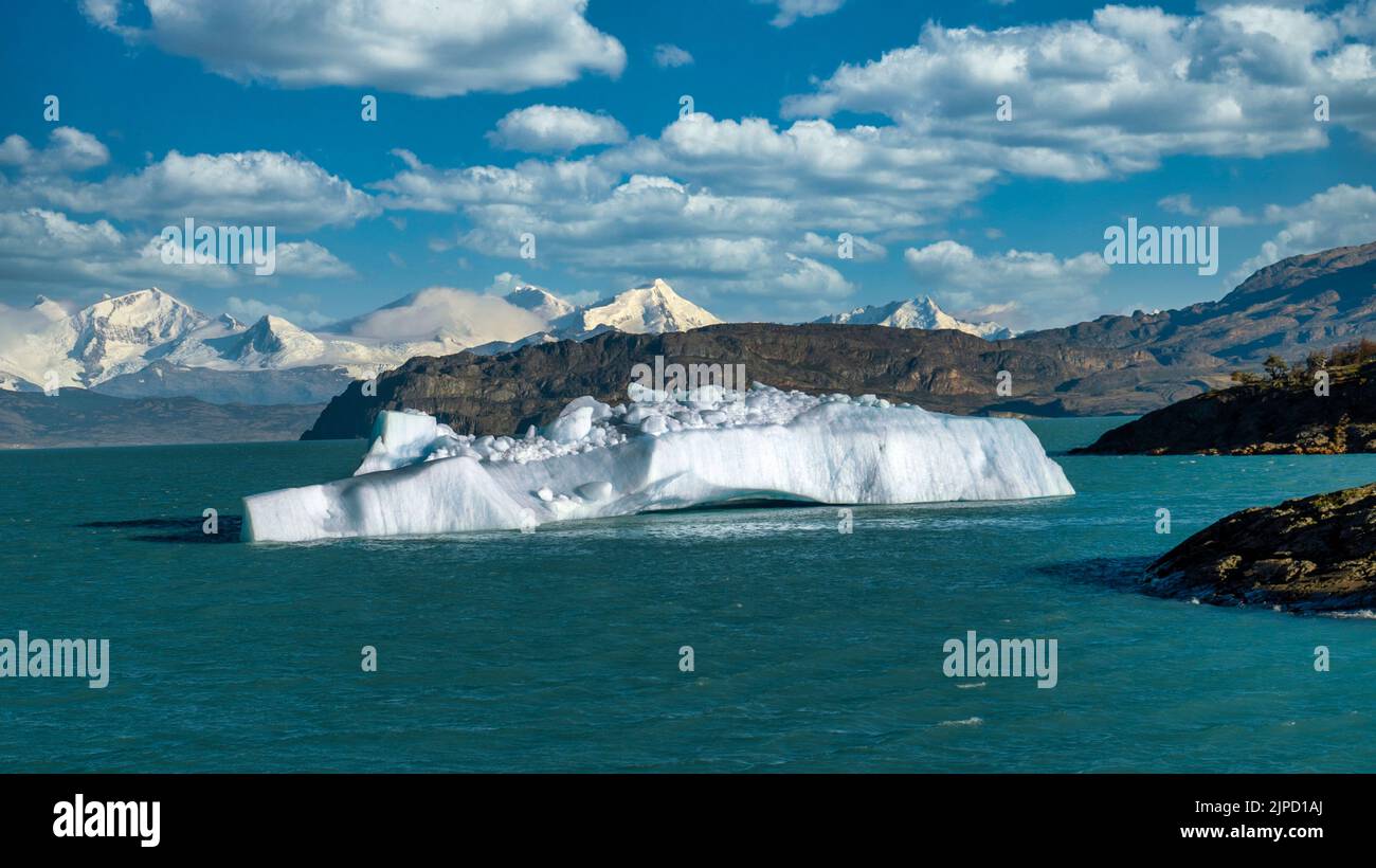 Huge ice blocks floating in the Argentino Lake under a cloudy sky Stock ...