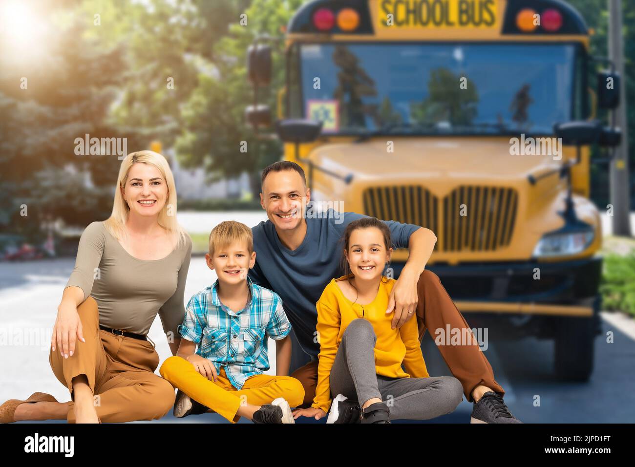 family together by the school bus Stock Photo - Alamy