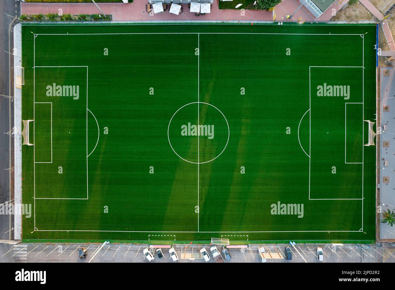 Aerial photographic documentation of an empty green football pitch ...