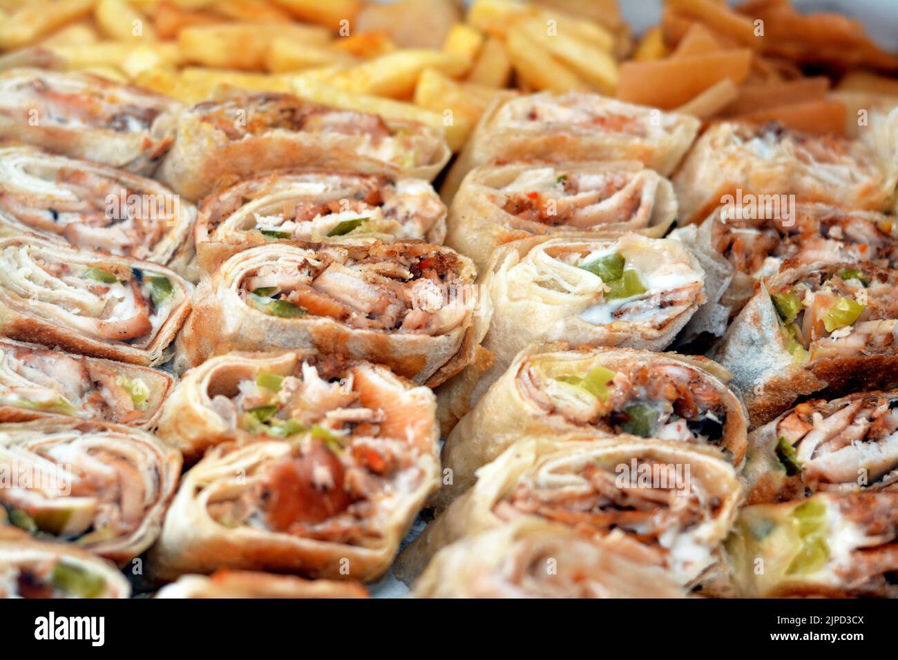 Syrian recipe cuisine background, a box full of pieces of chicken ...