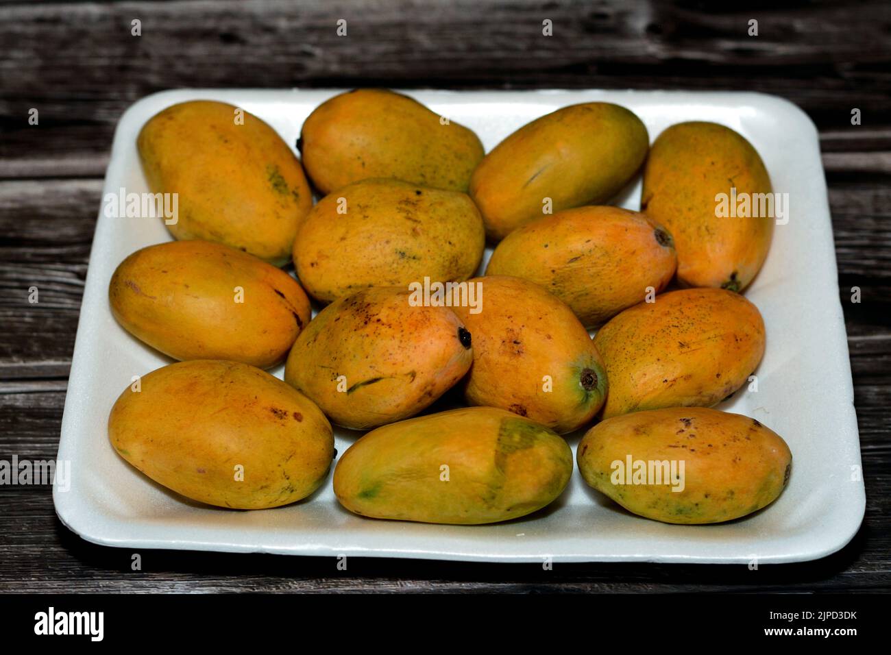 plate of Egyptian fresh mango fruit with tropical delicacy, mangoes are ...