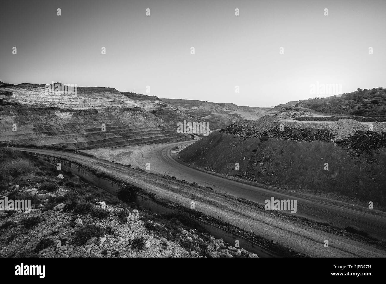 Mining site in the middle of Milos Island, Cyclades, Greece Stock Photo ...