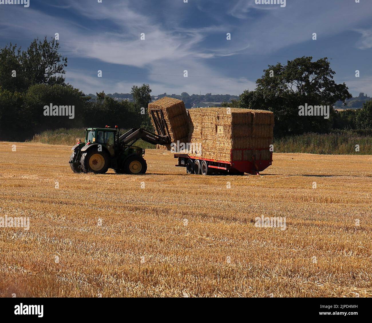 Farming in progress, Harvest Time Stock Photo - Alamy