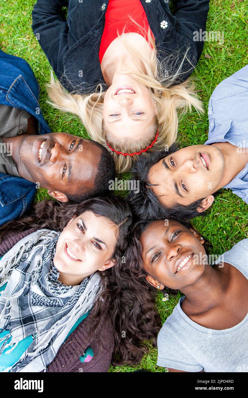 Teenage Students, circle of friends. A friendly group of diverse school ...