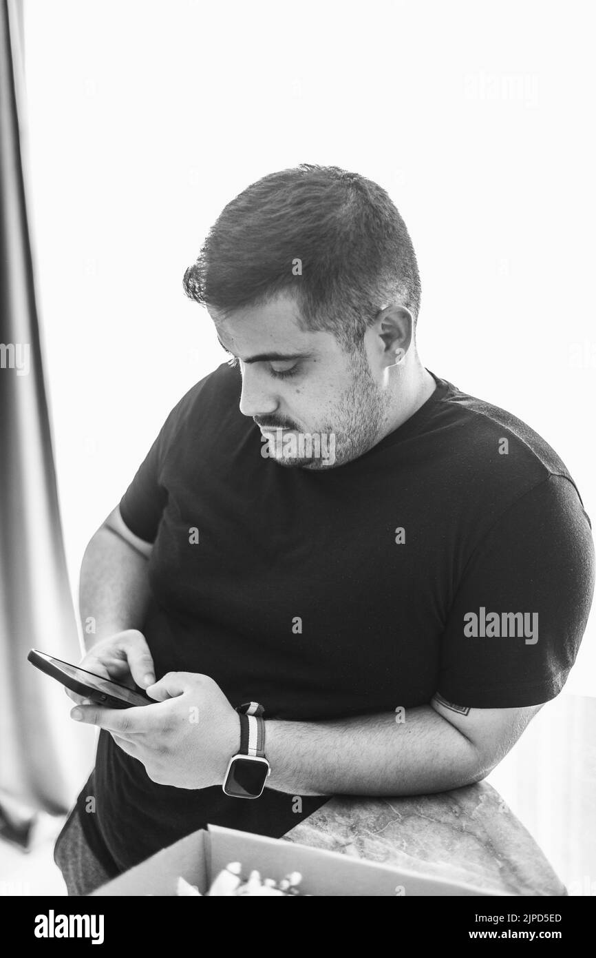 Man use phone Black and White Stock Photos & Images - Alamy