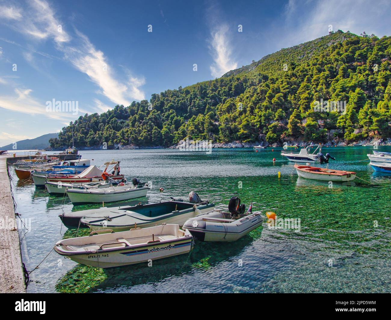 The boats in a beach in Agnontas village on Skopelos island, Greece ...