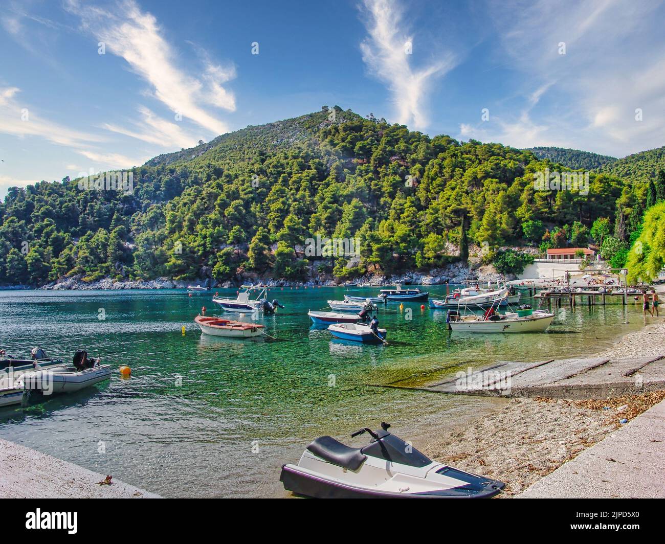 The boats in a beach in Agnontas village on Skopelos island, Greece ...