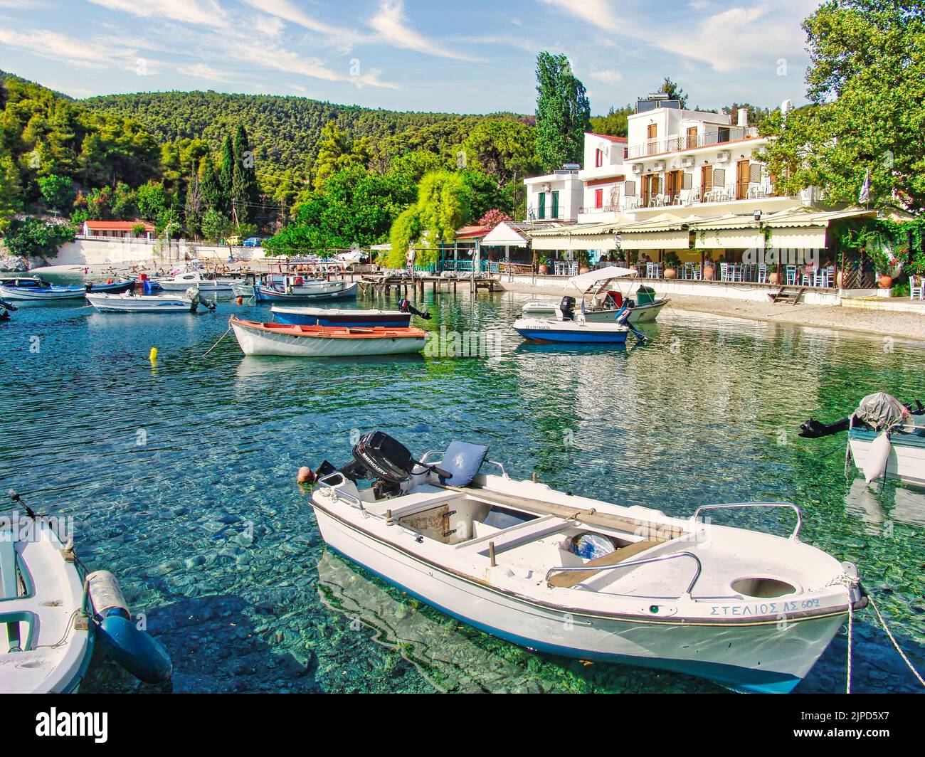 The boats in a beach in Agnontas village on Skopelos island, Greece ...