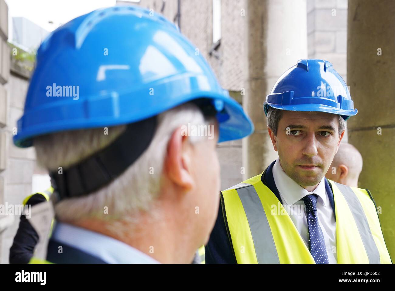 Higher Education Minister Simon Harris (right) during a visit to ...