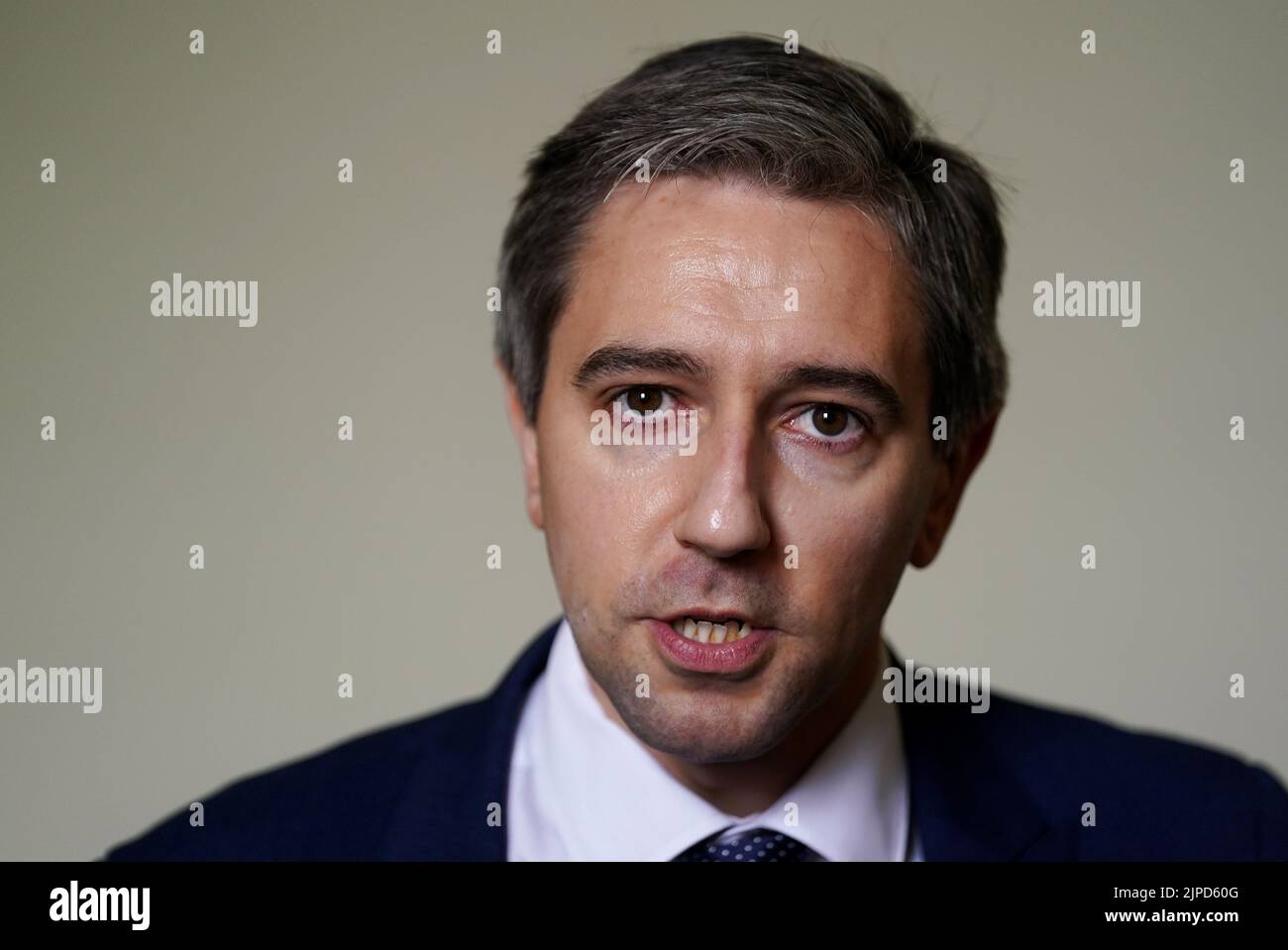 Higher Education Minister Simon Harris speaking to the media following ...