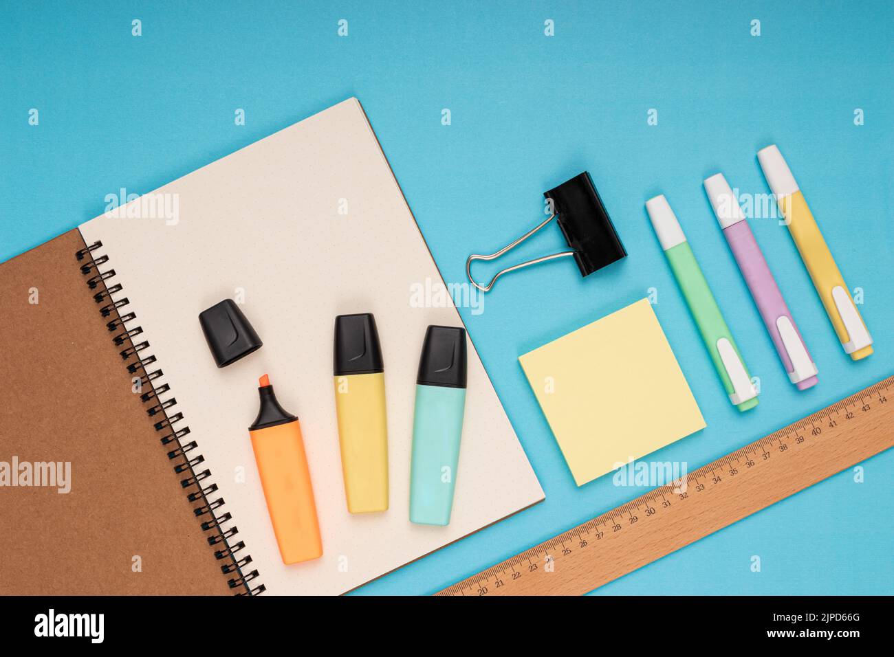 Notebook, colored pencils, ruler, note paper and clamp. back to school ...
