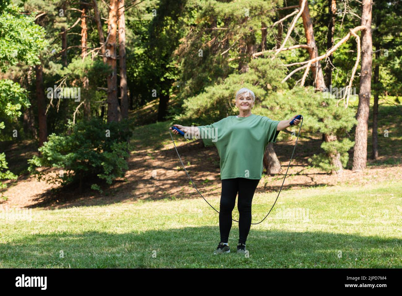 Senior woman jumping rope hi-res stock photography and images - Alamy