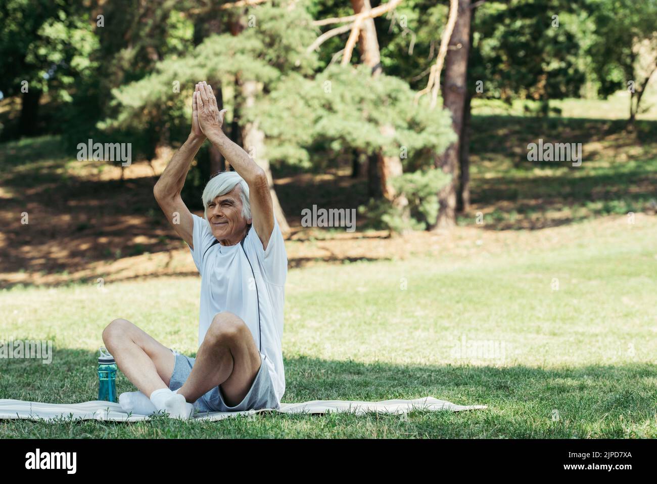 Full length grass hands above head hi-res stock photography and images ...