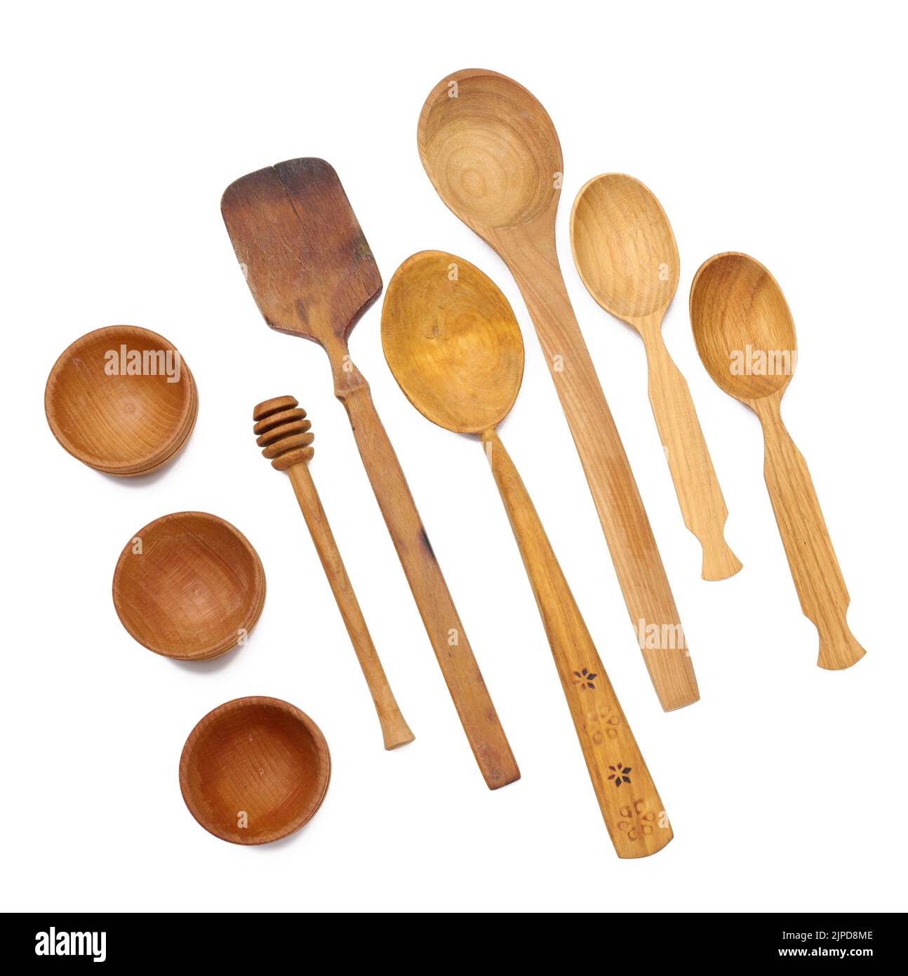 Empty wooden spoons and wooden bowls on a white isolated background ...