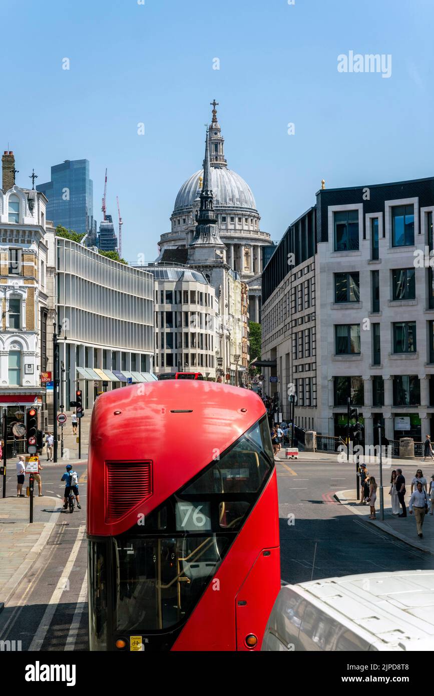 A Red London Bus Travels Along Fleet Street With A View Of St Paul's ...