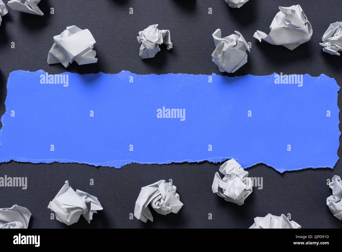 Tear On Sheet Reveals Background Behind The Front Side Stock Photo - Alamy