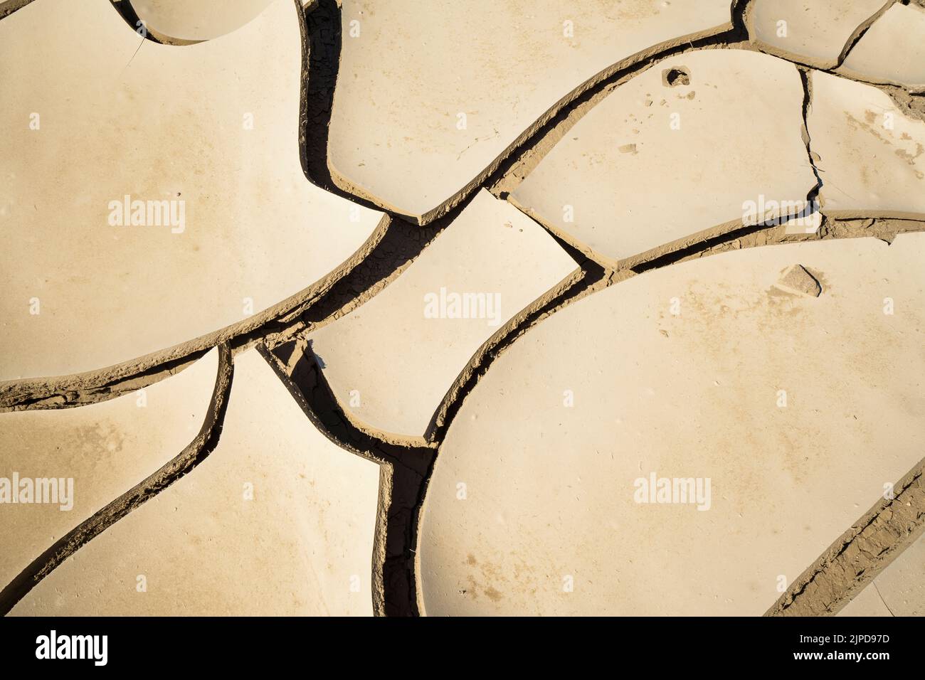 Clay patterns in a dry river bed, climate change symbolic. Swakop River ...