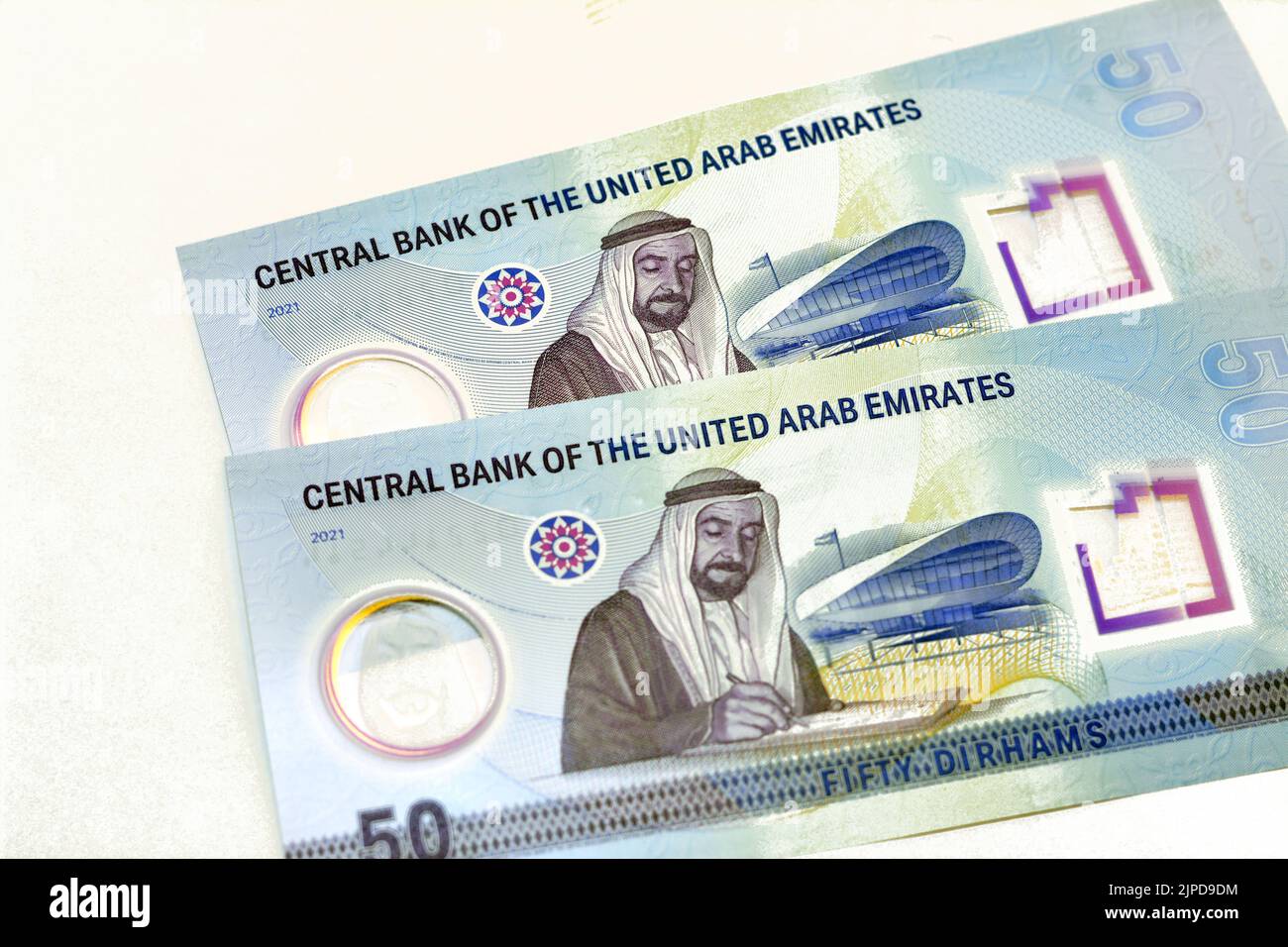 Reverse sides of the new polymer commemorative 50 fifty Dirhams of ...