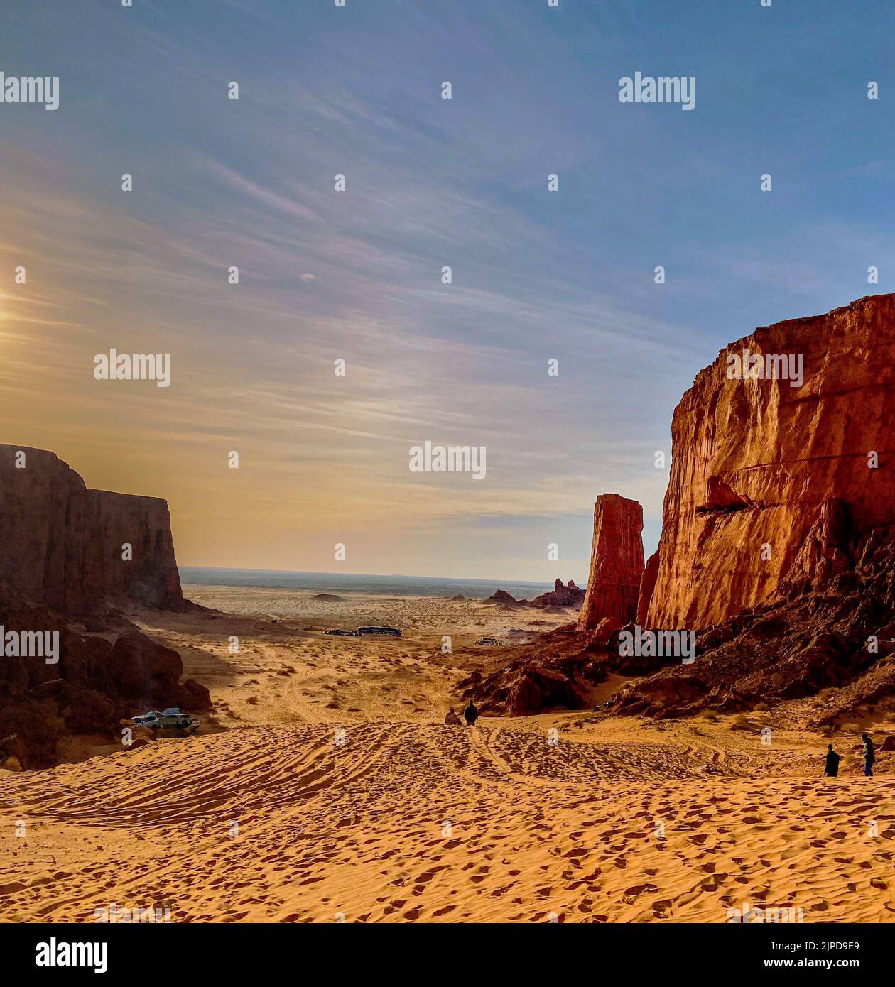 An aerial view of desert with rock formations in Algeria during sunset ...