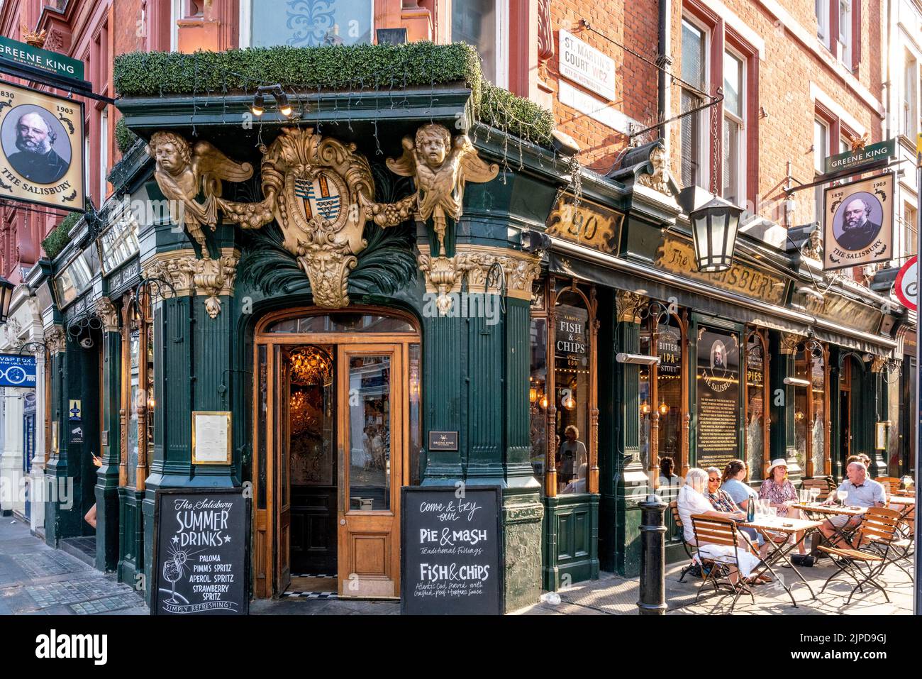 People Sitting Outside The Salisbury Pub In St Martin's Lane, London ...
