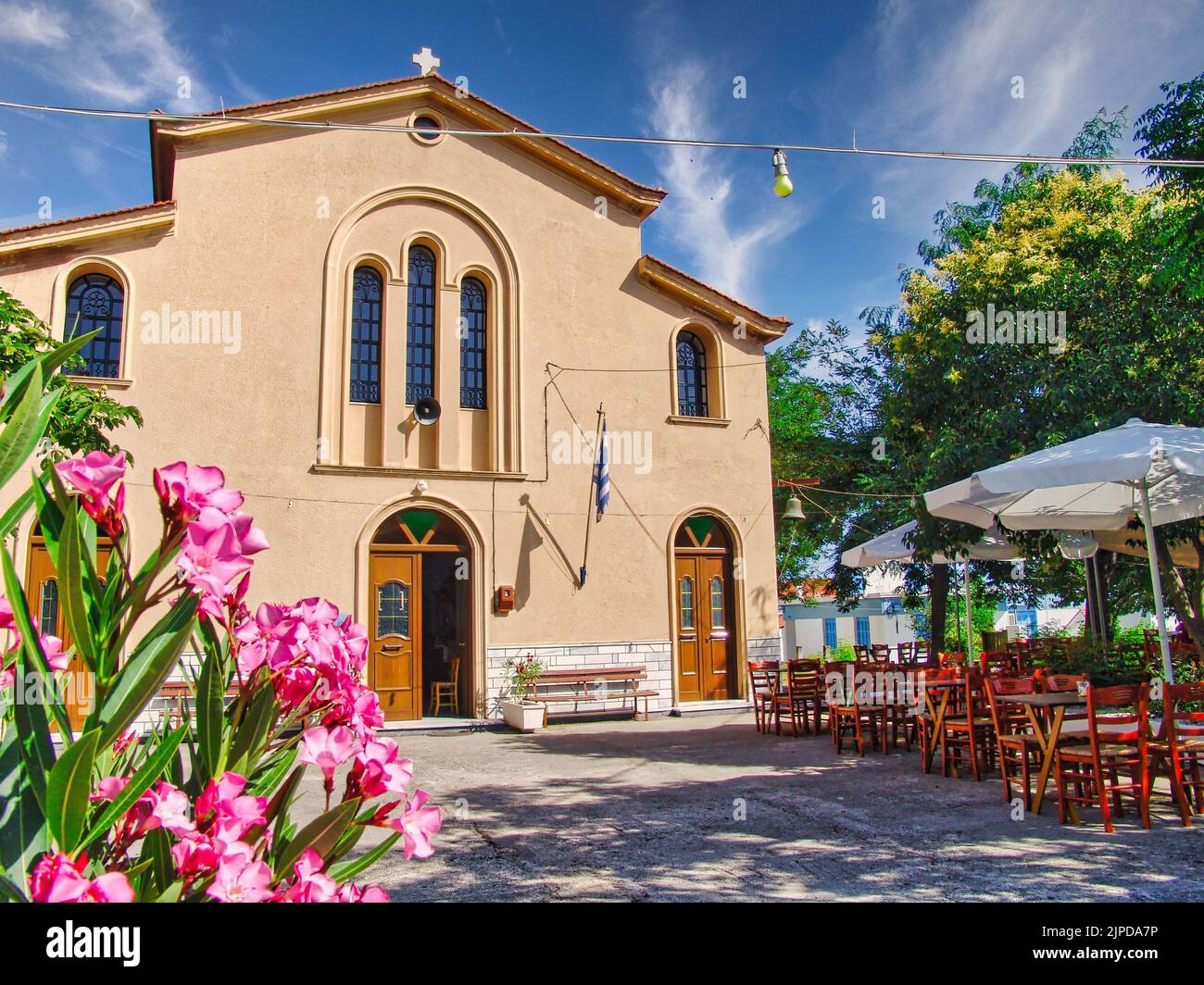 The entrance of a building in Skopelos island, Greece with furniture ...