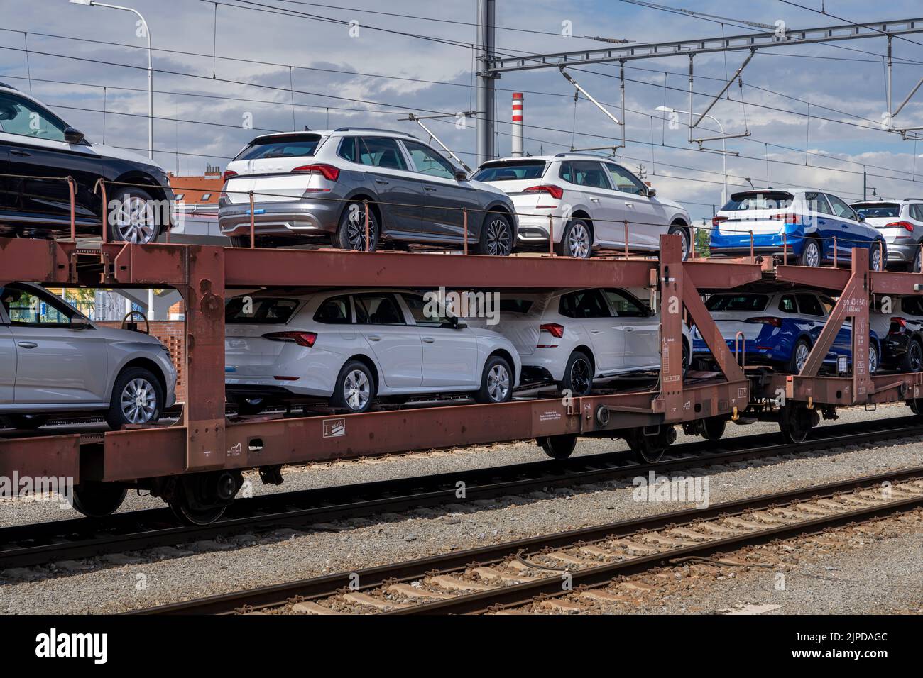 The process of transportation of cars by rail on special wagons. Pilsen ...