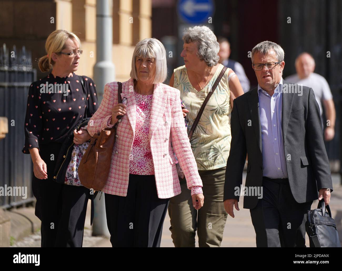 Jane Midgley(second left), mother of victim Simon Midgley, arrives for ...