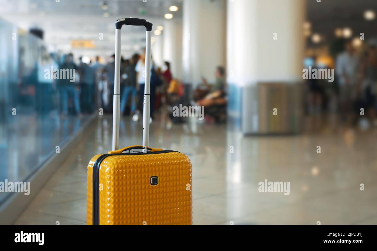 Forgotten travel bag in the airport Stock Photo - Alamy