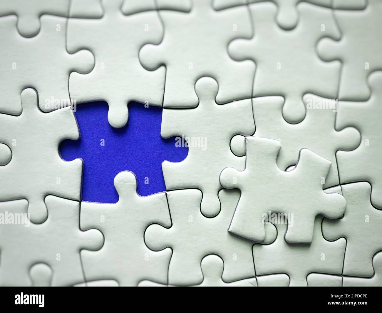 Blue jigsaw puzzle one piece hi-res stock photography and images - Alamy