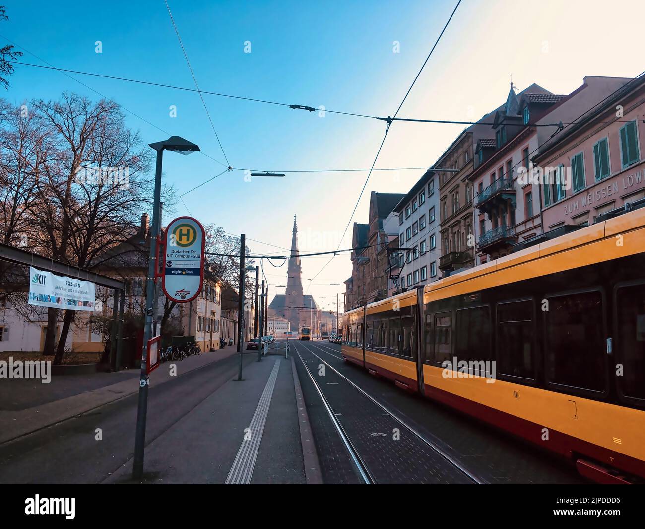 A yellow tram against the city of Heidelberg, Germany Stock Photo - Alamy