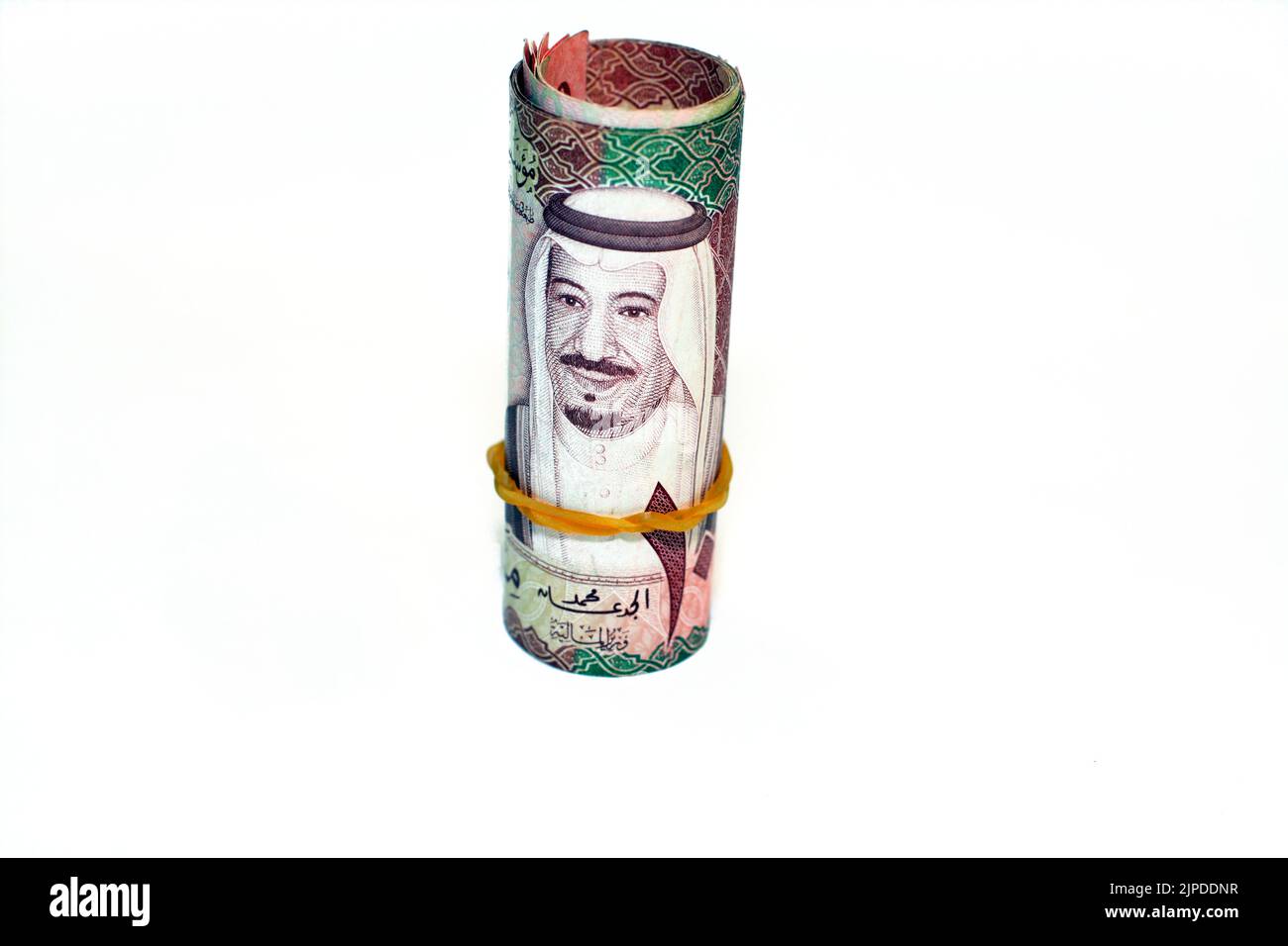 100 one hundred Saudi Arabia money roll riyals banknotes isolated on ...