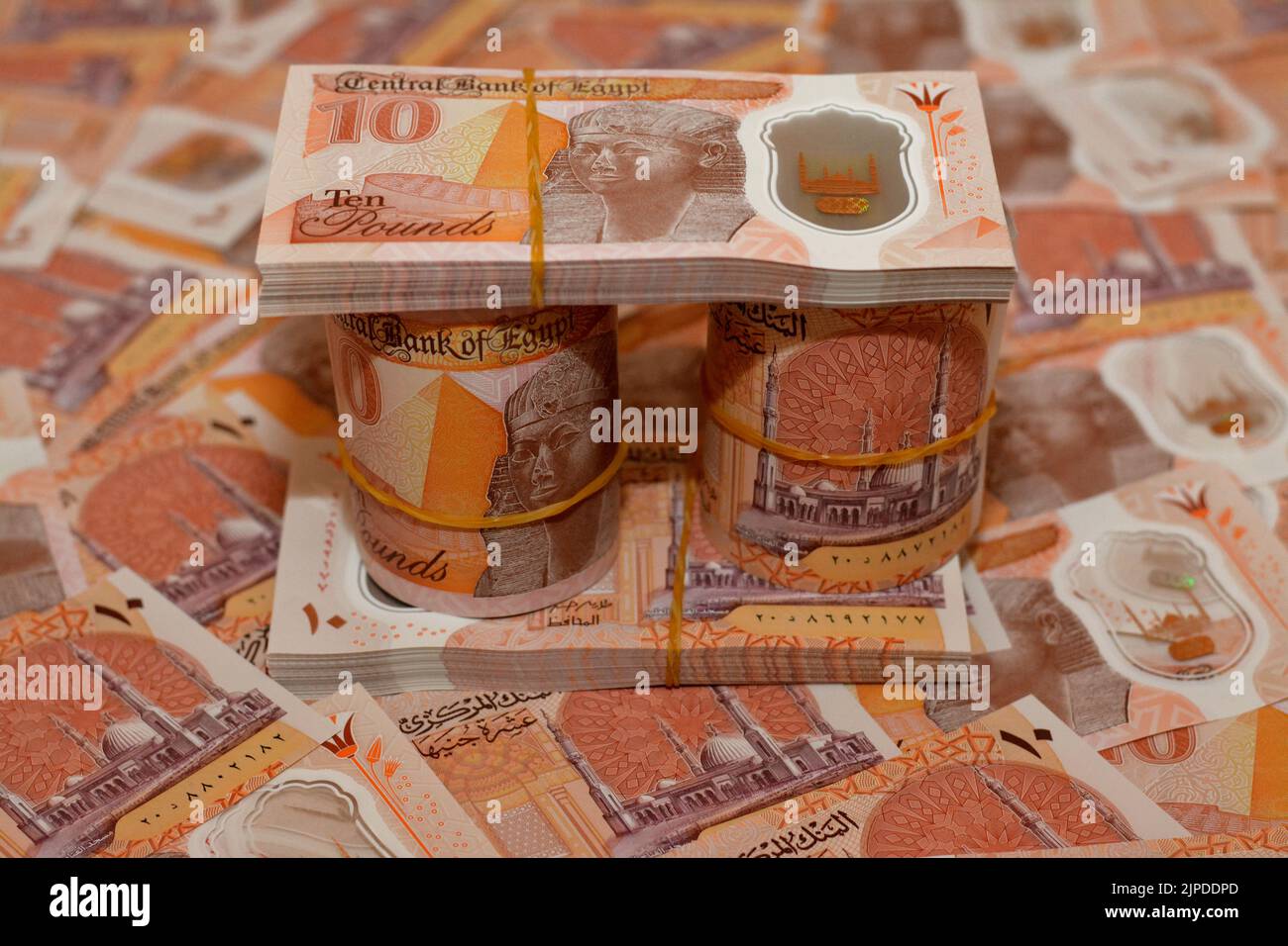Egypt money rolls and stacks of new first Egyptian 10 LE EGP ten pounds ...