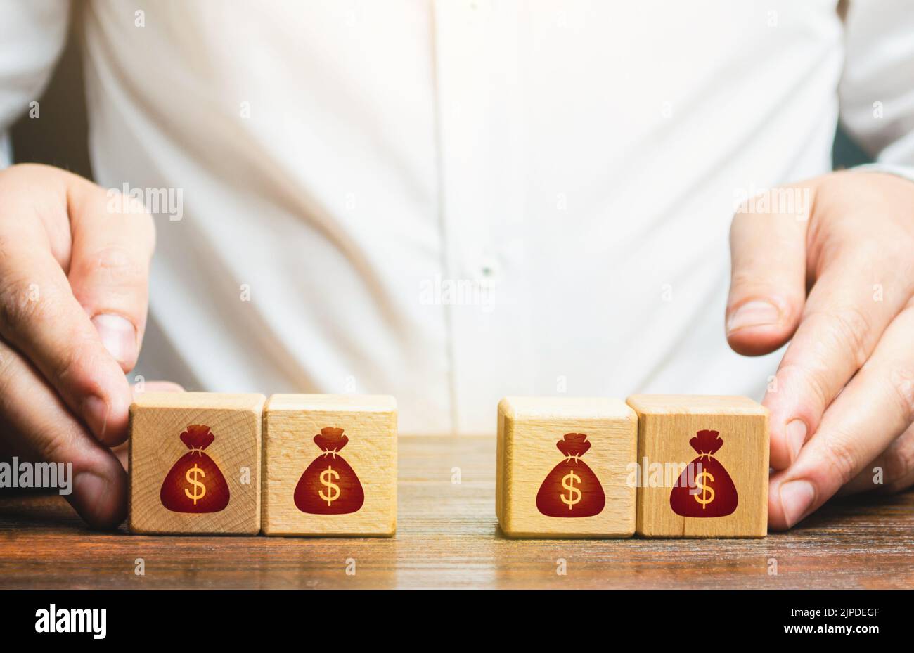 A man gathers together money funds and capital. Profit collection and ...