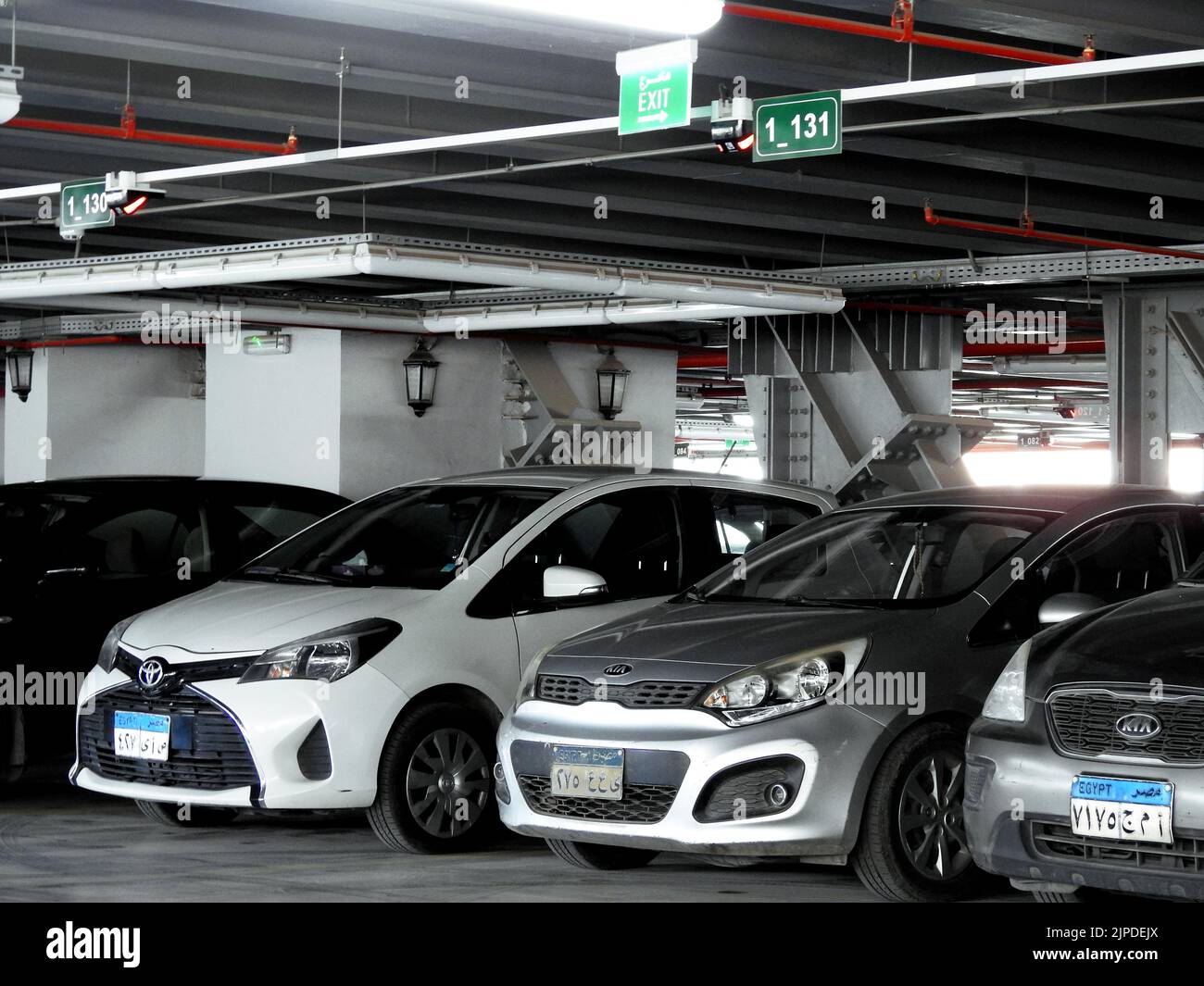 Cairo, Egypt, April 14 2022: Parked cars inside a multilevel parking ...