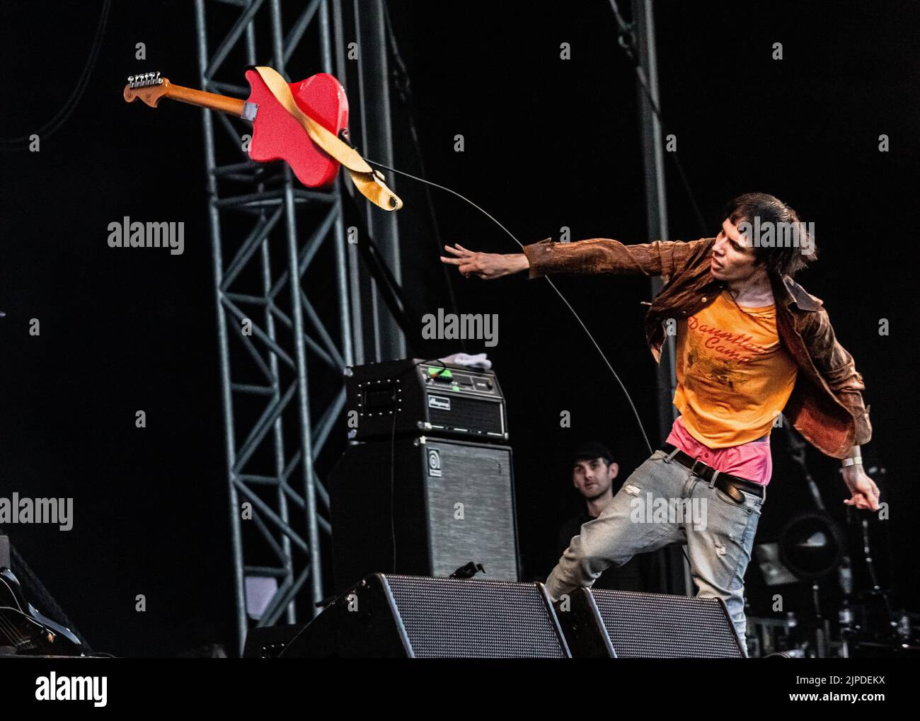 Ryan Jarman of The Cribs throwing a guitar across the stage at the end of their performance at ...