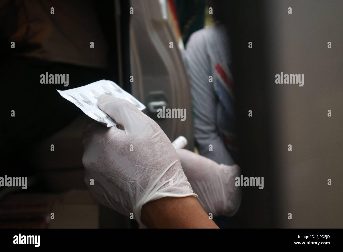 Health workers who are treating patients in the field Stock Photo - Alamy
