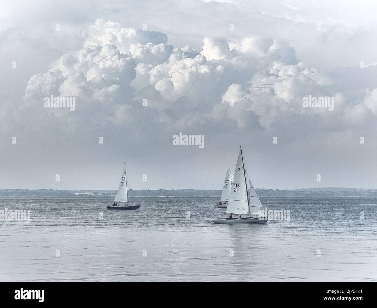 Calm after the storm, the view across the solent to the thunderstorm in ...