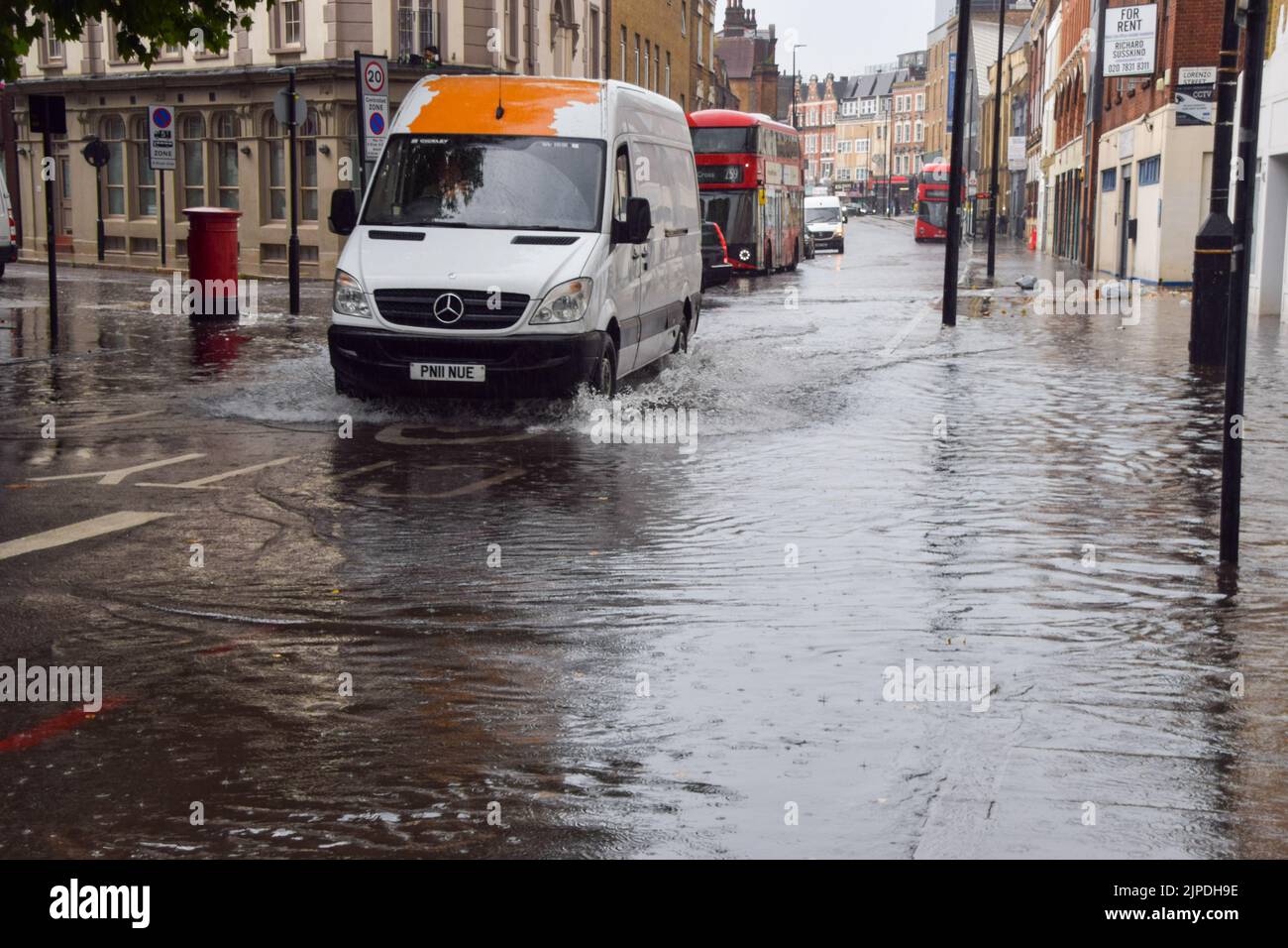 Puddle bus splash hi-res stock photography and images - Alamy