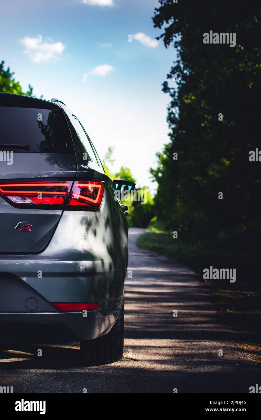 Car riding on asphalt hi-res stock photography and images - Alamy