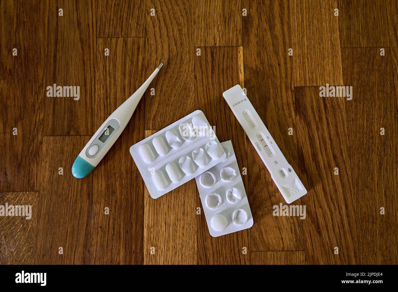 positive corona swipe test showing two bars for Covid 19 infection ...