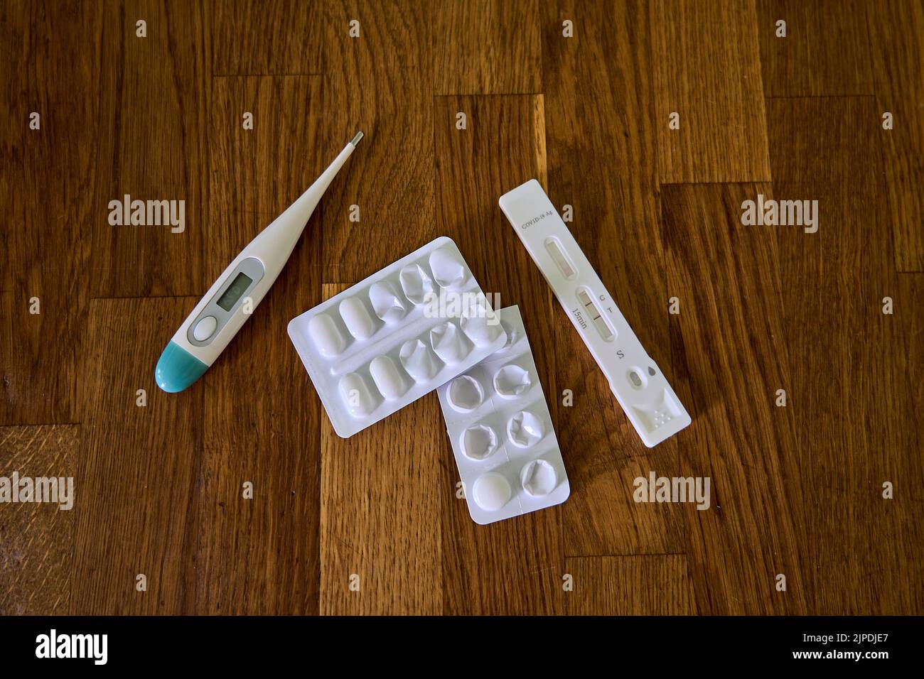 positive corona swipe test showing two bars for Covid 19 infection ...