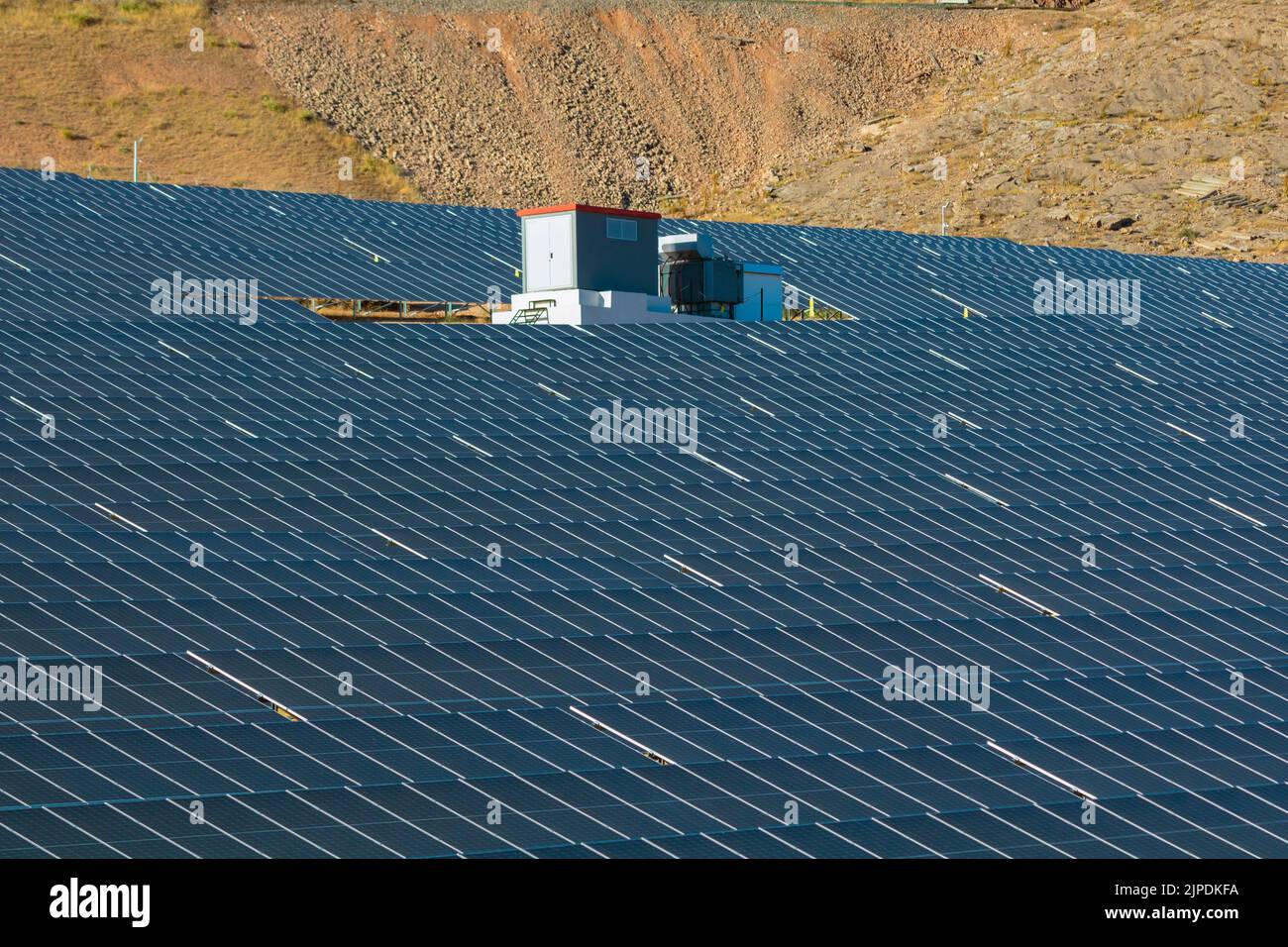 PV or photovoltaic panels of solar power plant on the hill. Renewable ...