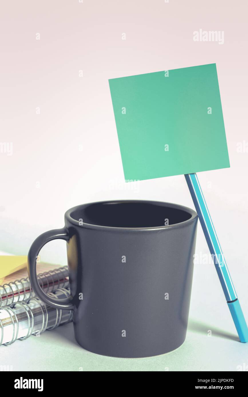 Notebook With Important Message On Desk With Pencil, Sharpener ...