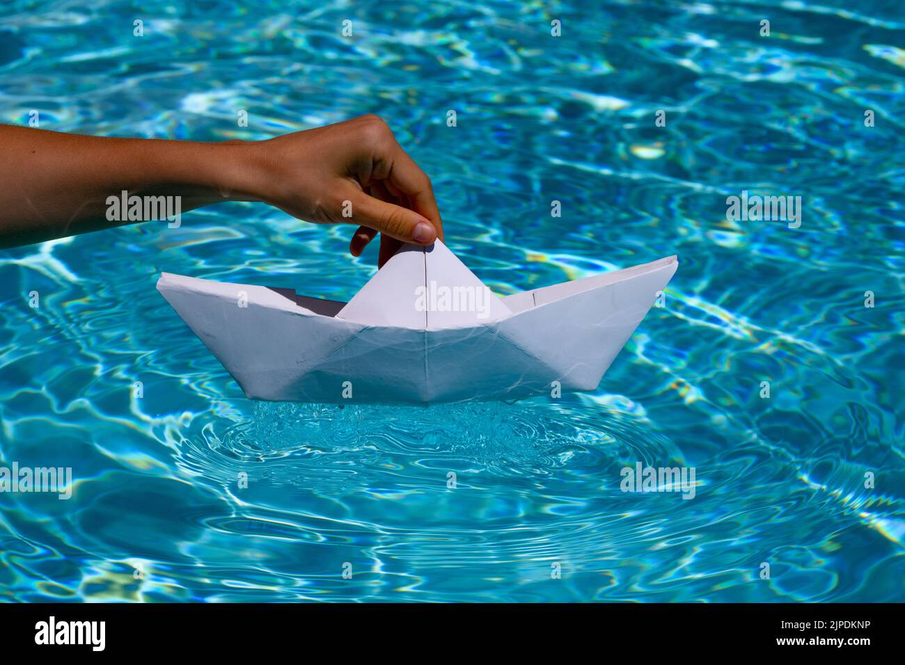 Hands causing water ripple hi-res stock photography and images - Alamy