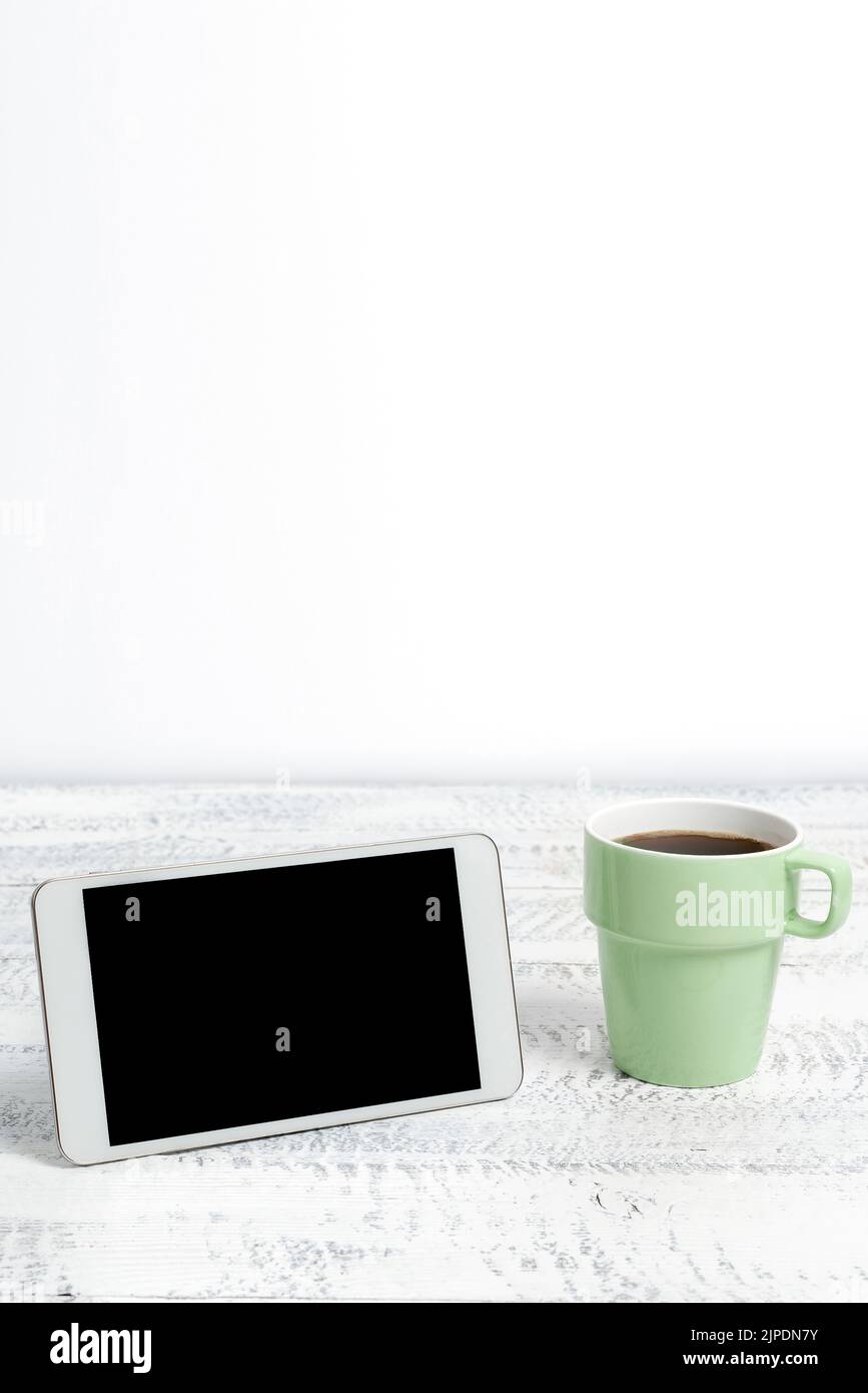 Important Messages Tablet On Desk With Pen, Notebook, Cup And Notes ...