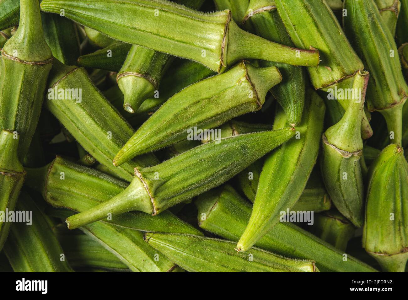 Fresh raw okra in a glass bowl. Healthy eating concept Stock Photo - Alamy