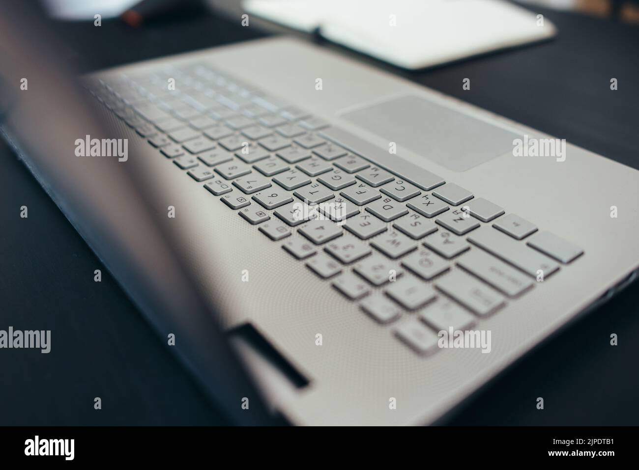 Gray laptop keyboard close up side view Stock Photo - Alamy
