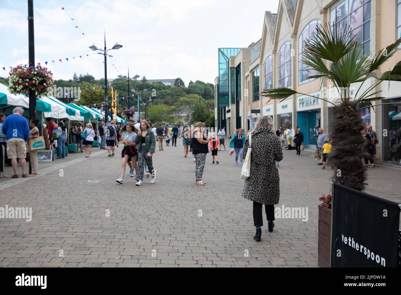 Truro, UK,17th August 2022,Truro was busy with shoppers on a cloudy ...