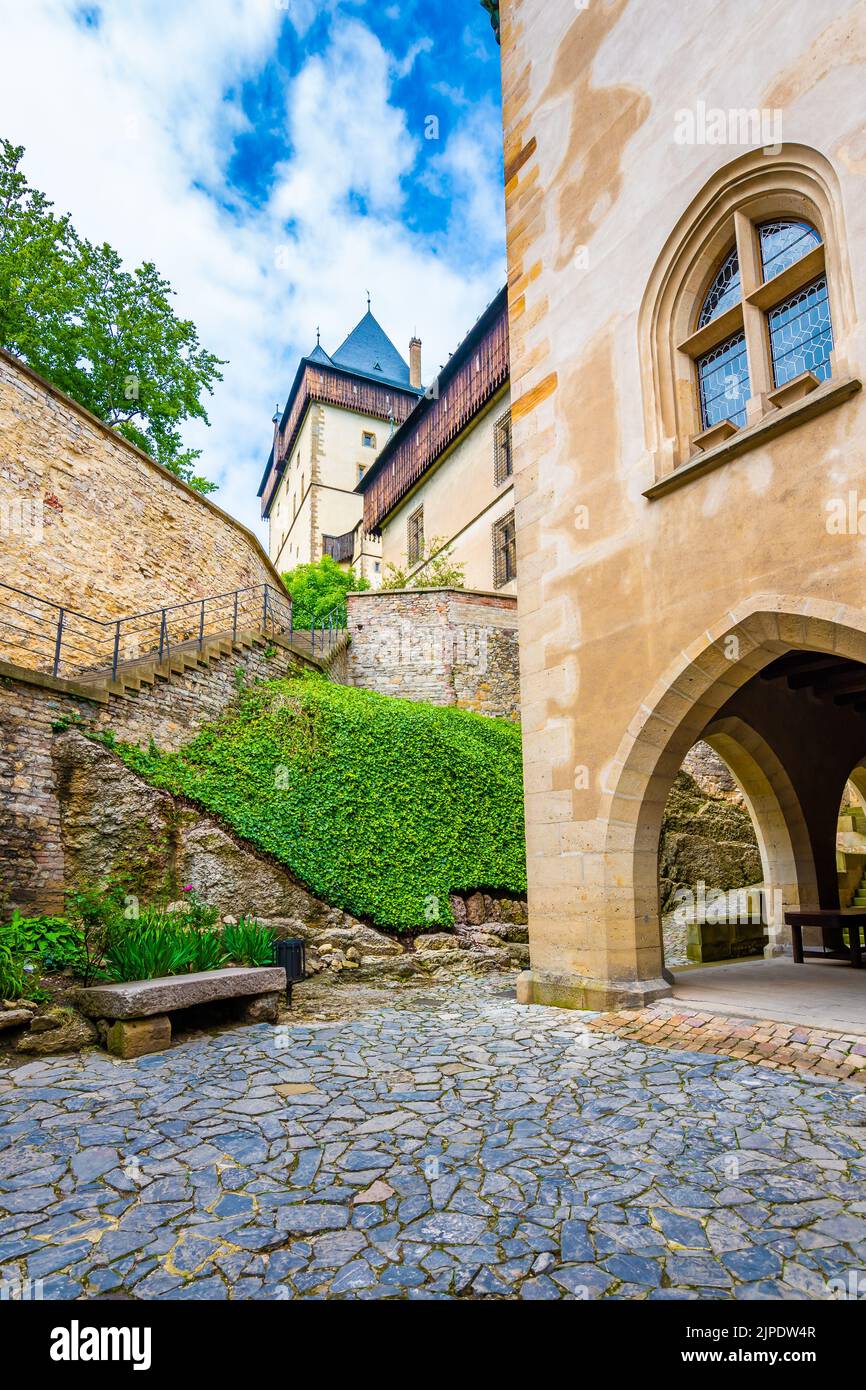 Famous medieval gothic castle Karlstejn on top of the hill. Beautiful ...